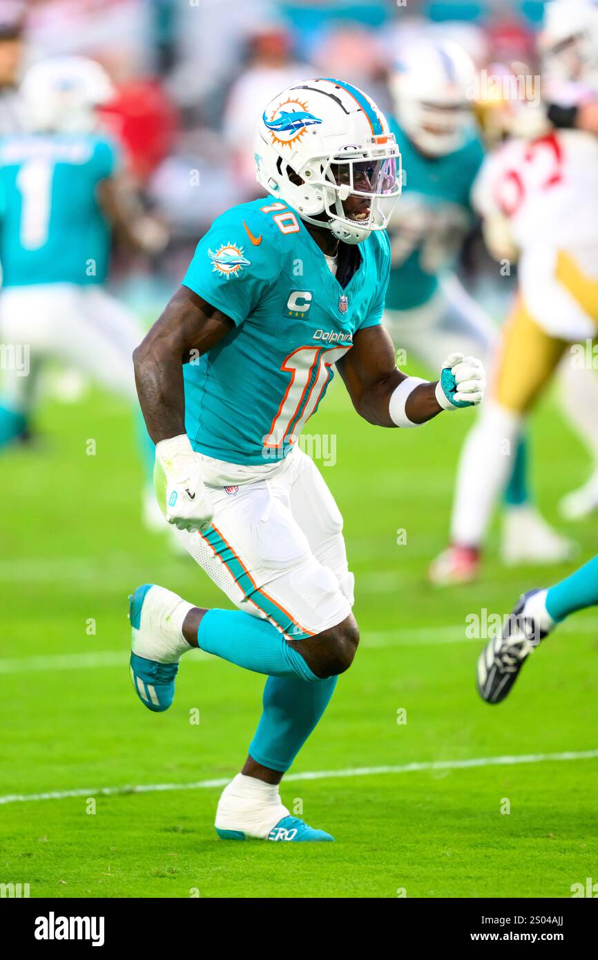 Miami Dolphins wide receiver Tyreek Hill (10) runs a play during an NFL ...