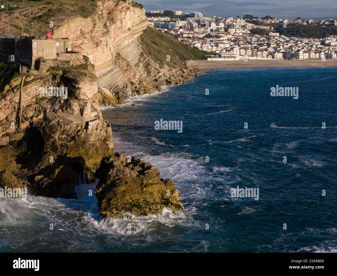 Aerial drone view of people admiring the giant waves from the ...