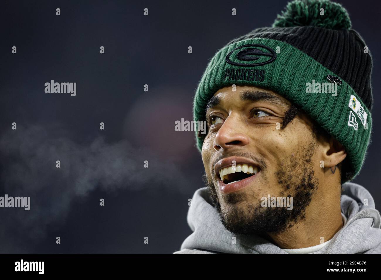 Green Bay Packers cornerback Jaire Alexander (23) walks on the field ...