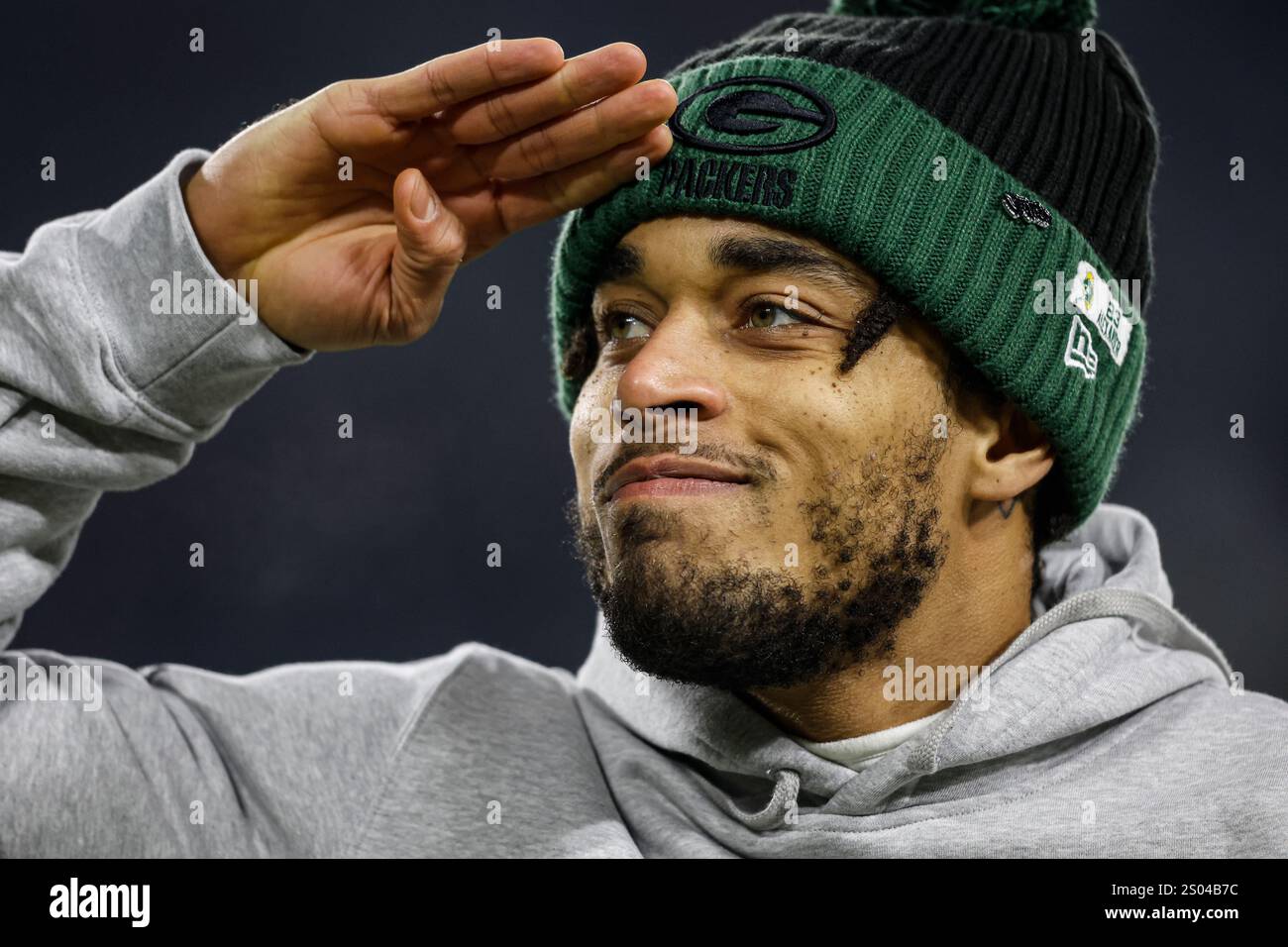 Green Bay Packers cornerback Jaire Alexander (23) walks on the field ...