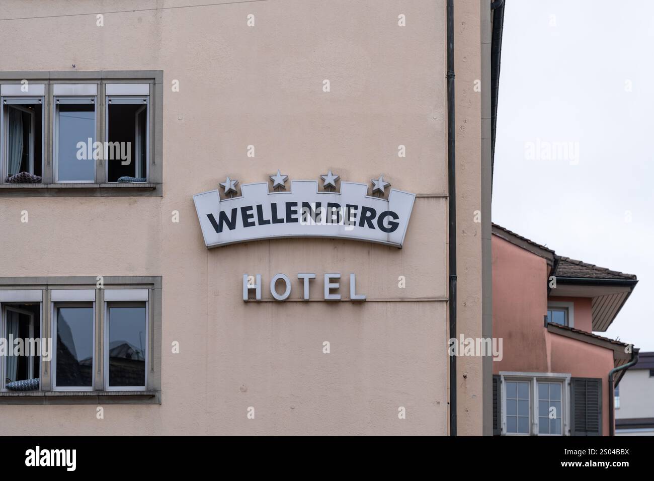 Zurich, Switzerland - December 8, 2024: Sign for the Wellenberg Hotel ...
