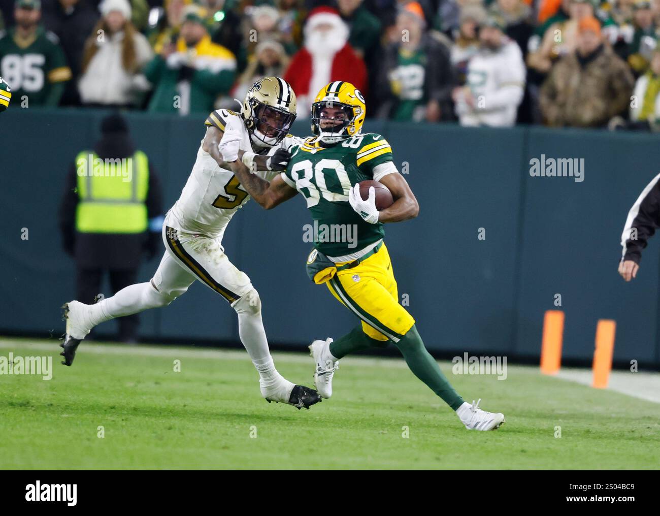 Green Bay Packers wide receiver Bo Melton (80) runs the ball against ...