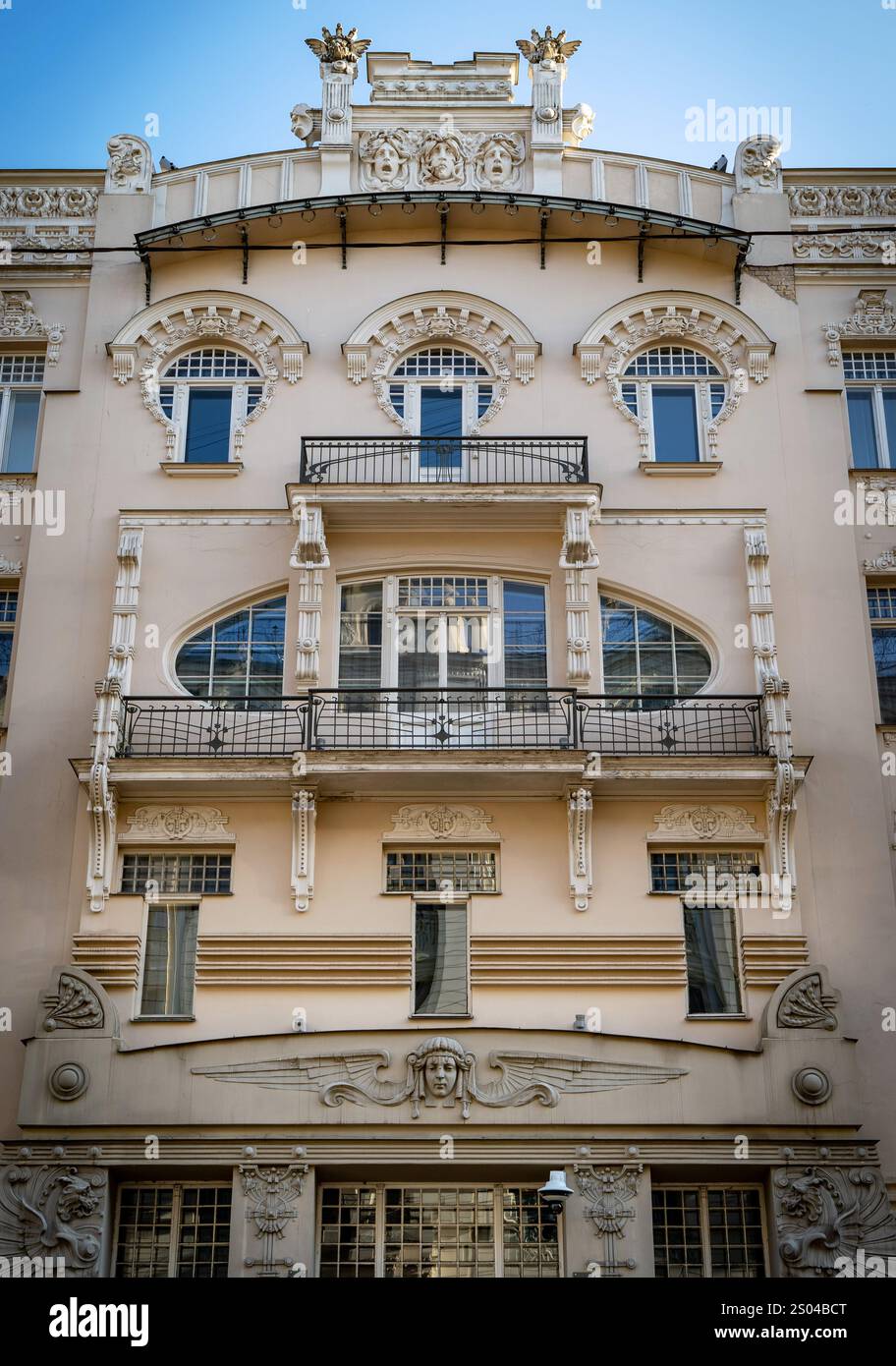 A beautifully ornate building facade featuring intricate architectural ...