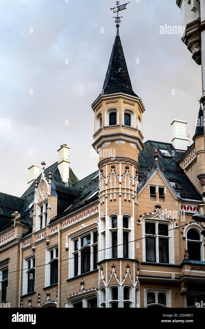 A close-up view of a historic building featuring intricate ...