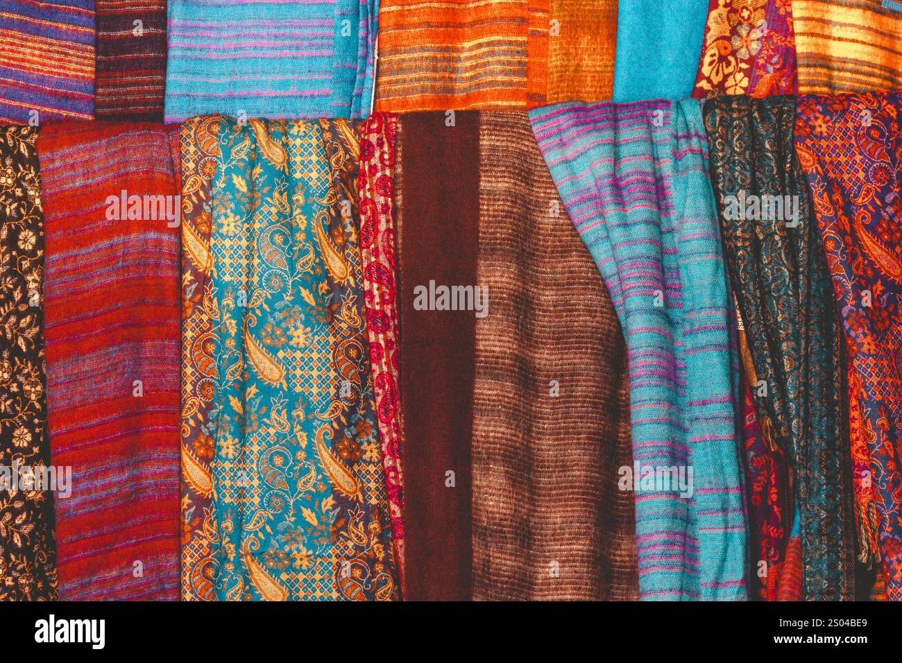 Textiles - blankets and scarves - for sale at a market Stock Photo - Alamy