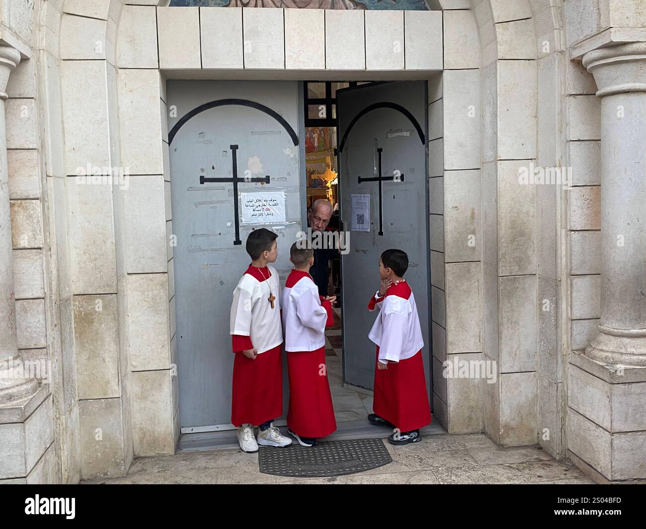 Palestinian Christians participate in the Christmas Mass at the Church ...