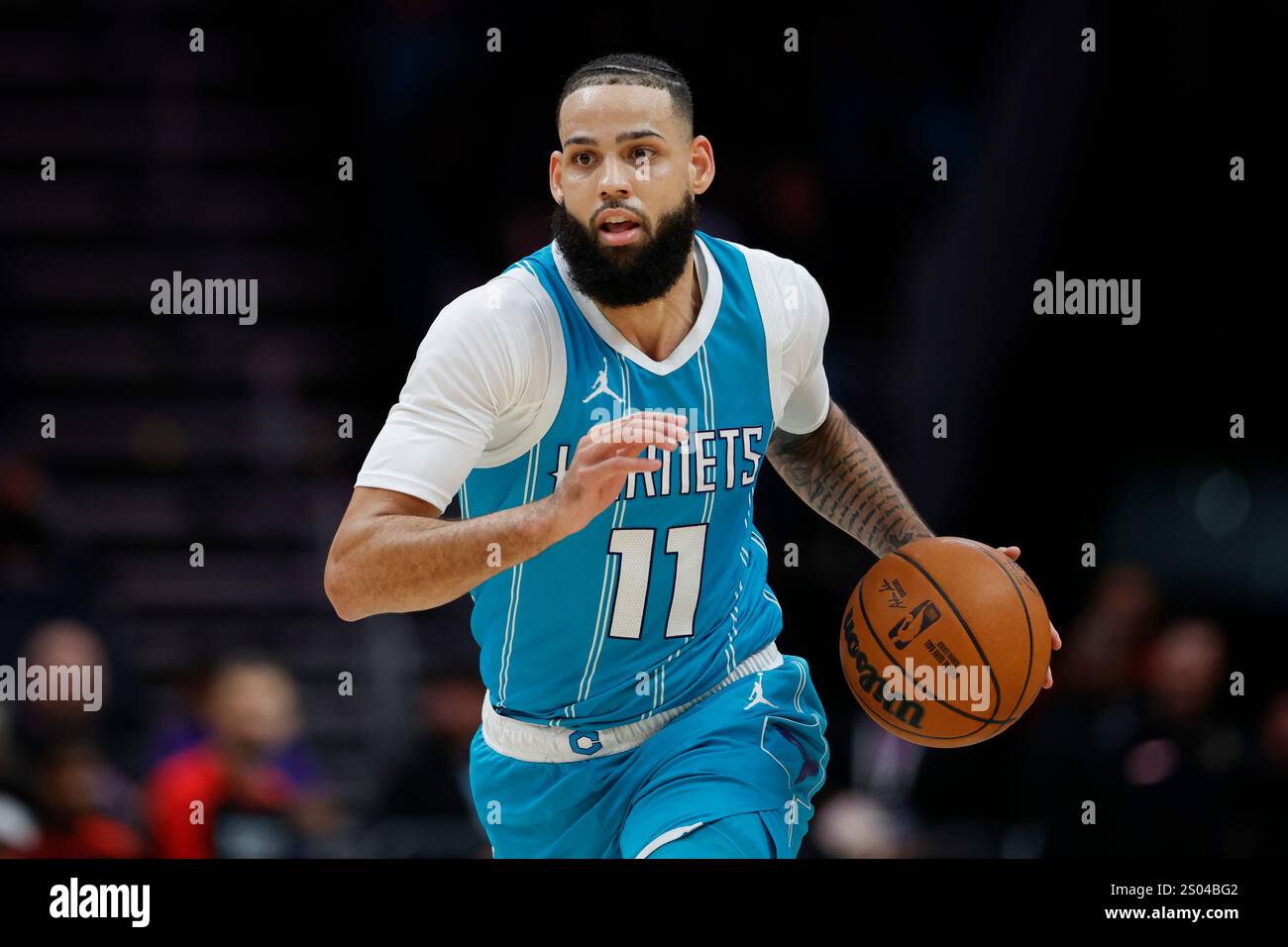 Charlotte Hornets forward Cody Martin brings the ball upcourt against ...