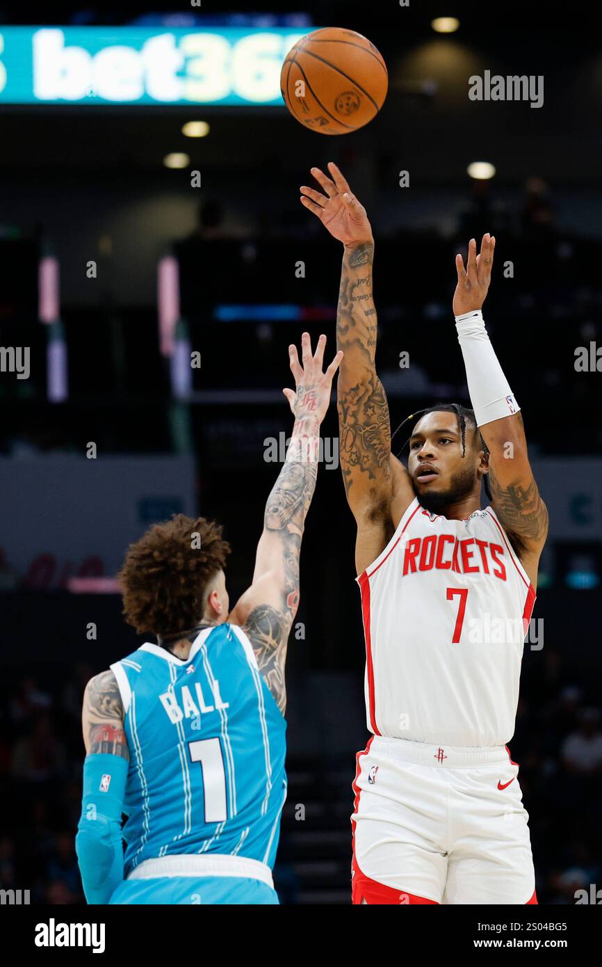Houston Rockets forward Cam Whitmore shoots over Charlotte Hornets ...