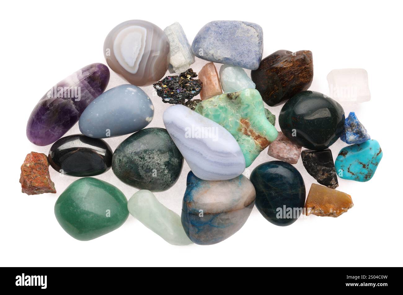 Pile of different natural mineral stones isolated on white, top view ...