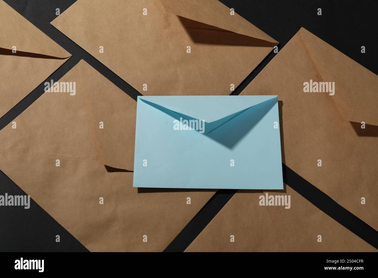 Paper envelopes on black background, above view. Mockup for design ...