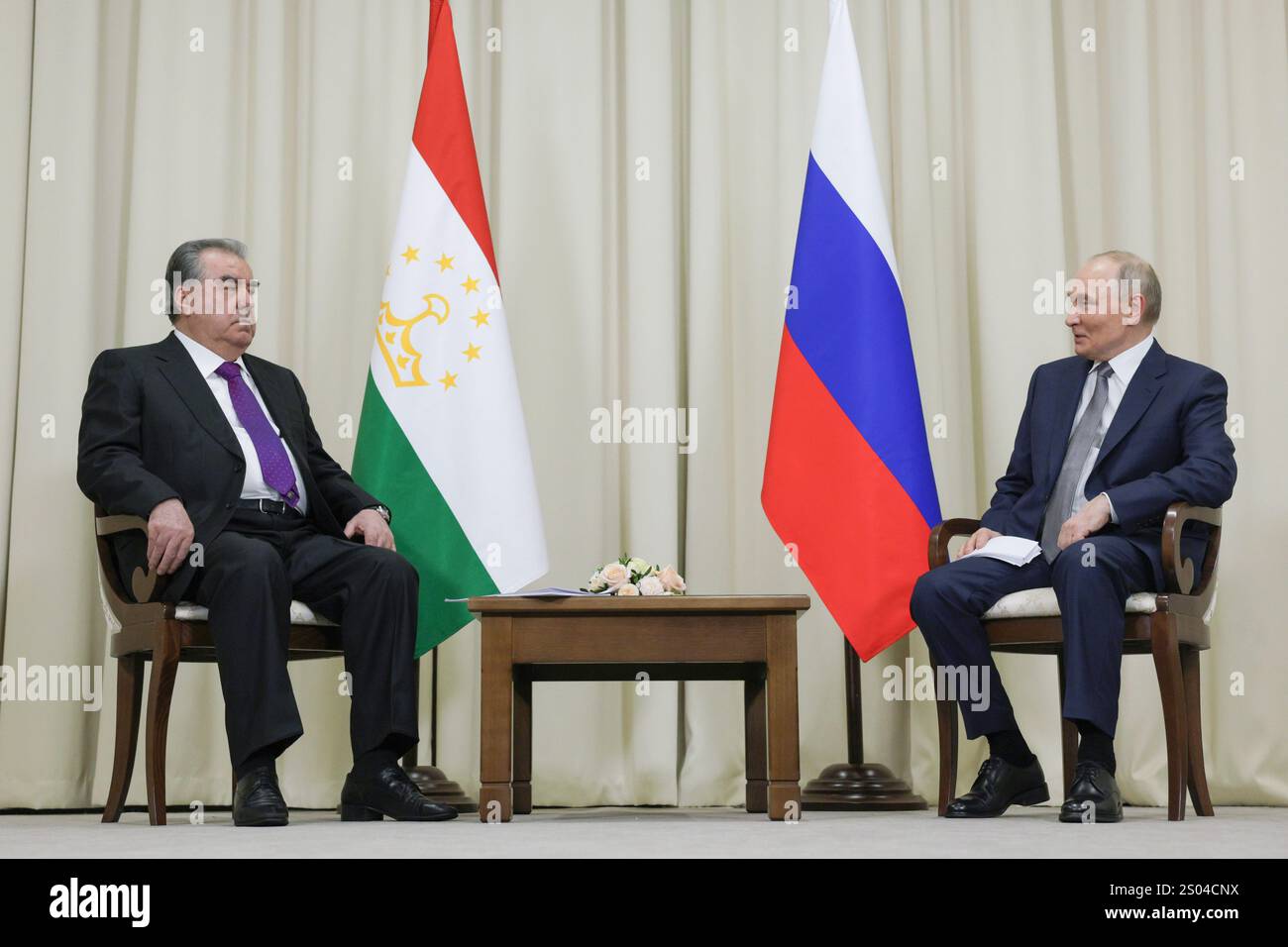 Russian President Vladimir Putin, right, and Tajik President Emomali ...