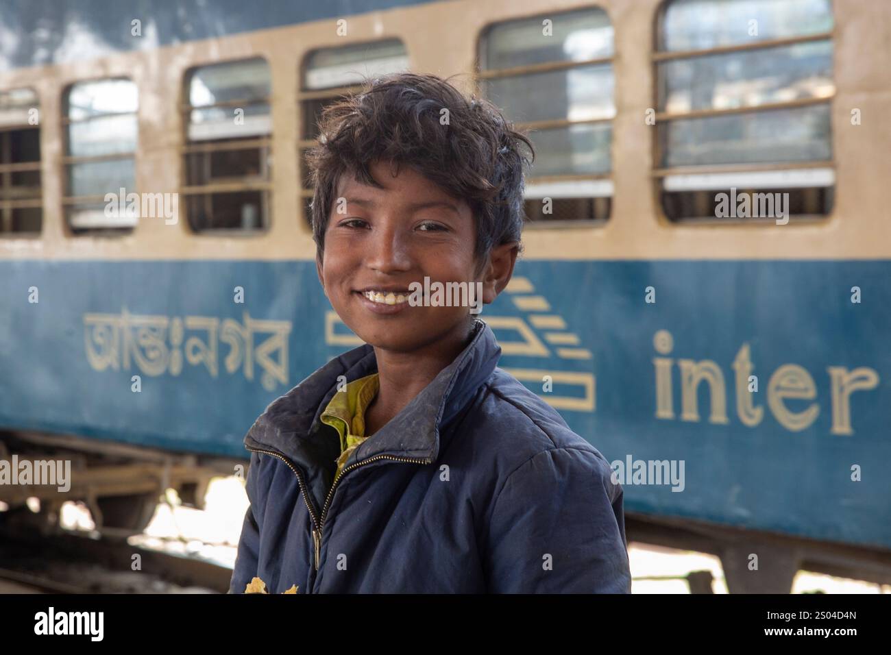 A poignant portrait of a street boy in Dhaka, Bangladesh, capturing the resilience and struggles ...