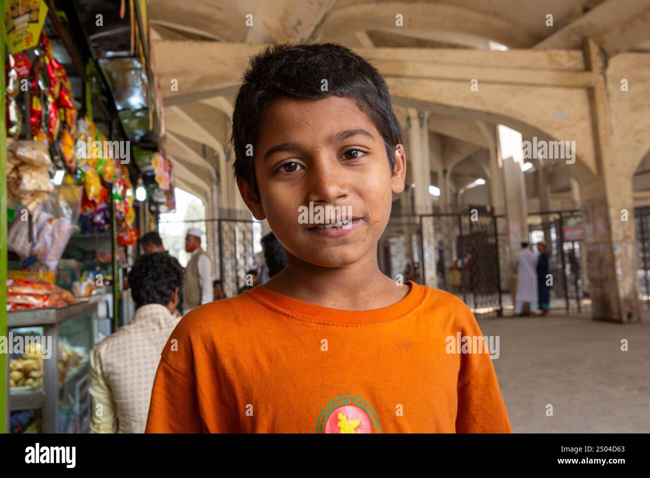 A poignant portrait of a street boy in Dhaka, Bangladesh, capturing the ...