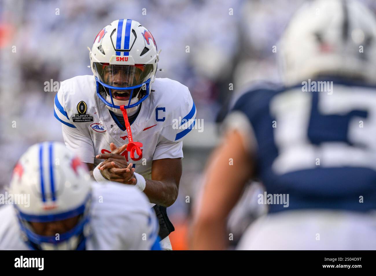 State College, PA, USA. 21st Dec, 2024. Southern Methodist Mustangs quarterback Kevin Jennings ...