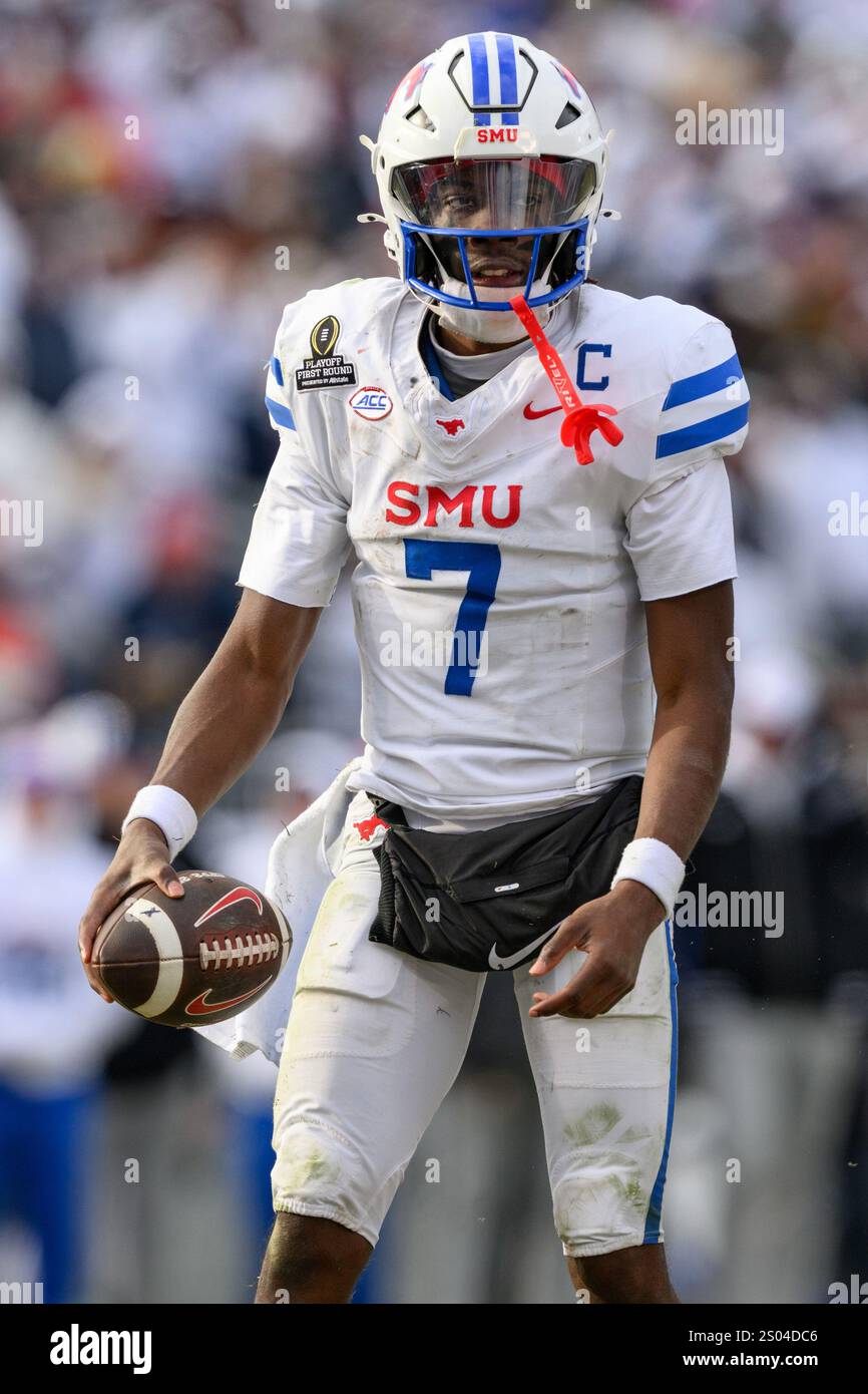 State College, PA, USA. 21st Dec, 2024. Southern Methodist Mustangs quarterback Kevin Jennings ...