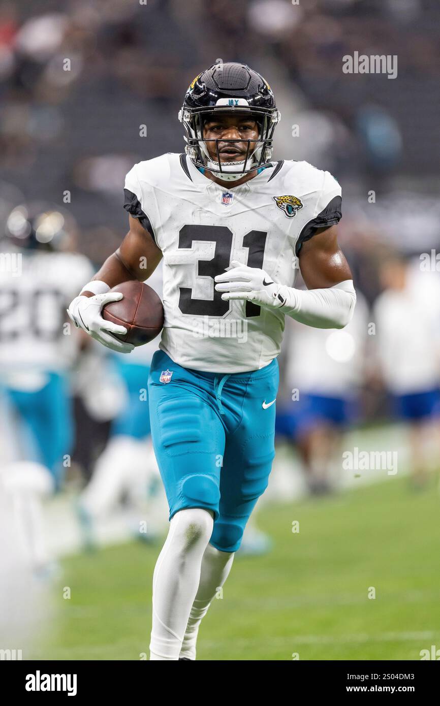 Jacksonville Jaguars running back Keilan Robinson (31) warms up before ...