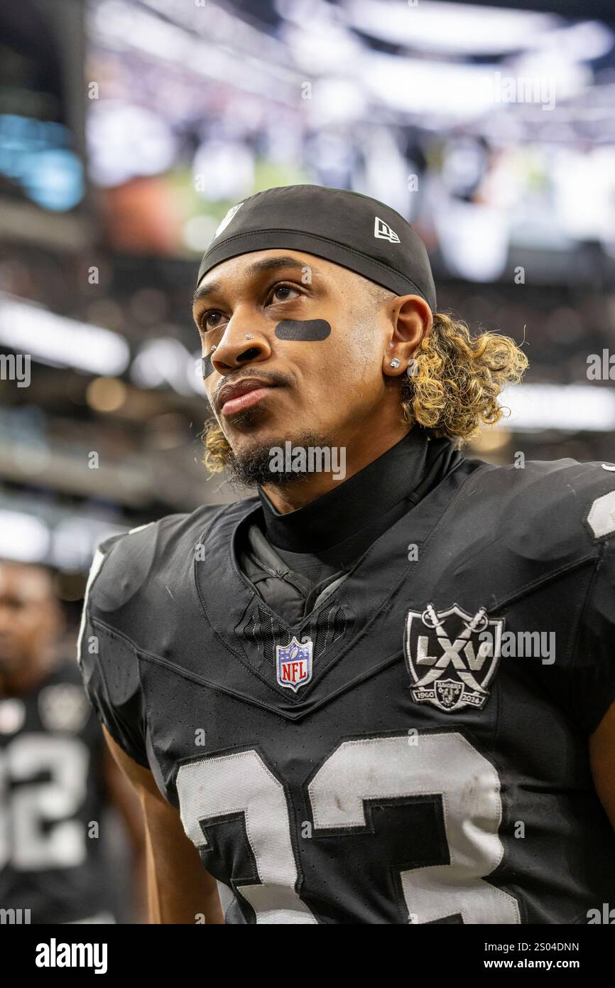 Las Vegas Raiders running back Chris Collier (33) walks off the field after warming up before ...