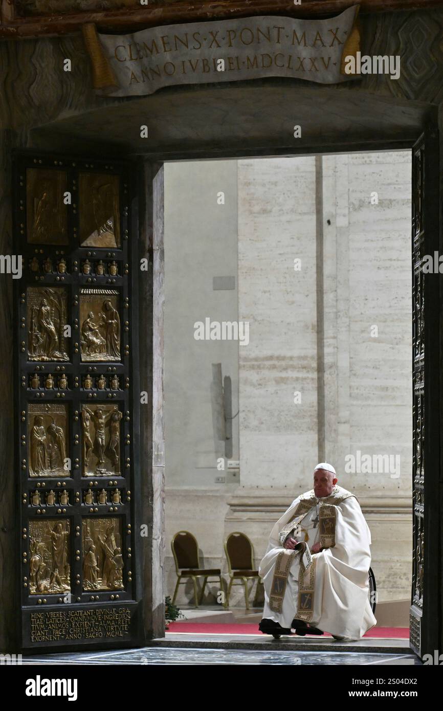 Pope Francis opens the Holy Door of St Peter's Basilica to mark the ...