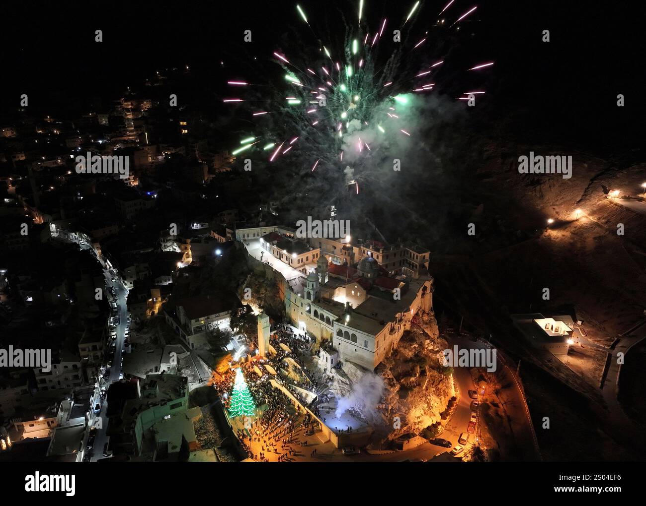 Fireworks burst over Saydnaya Convent during the lighting of the ...