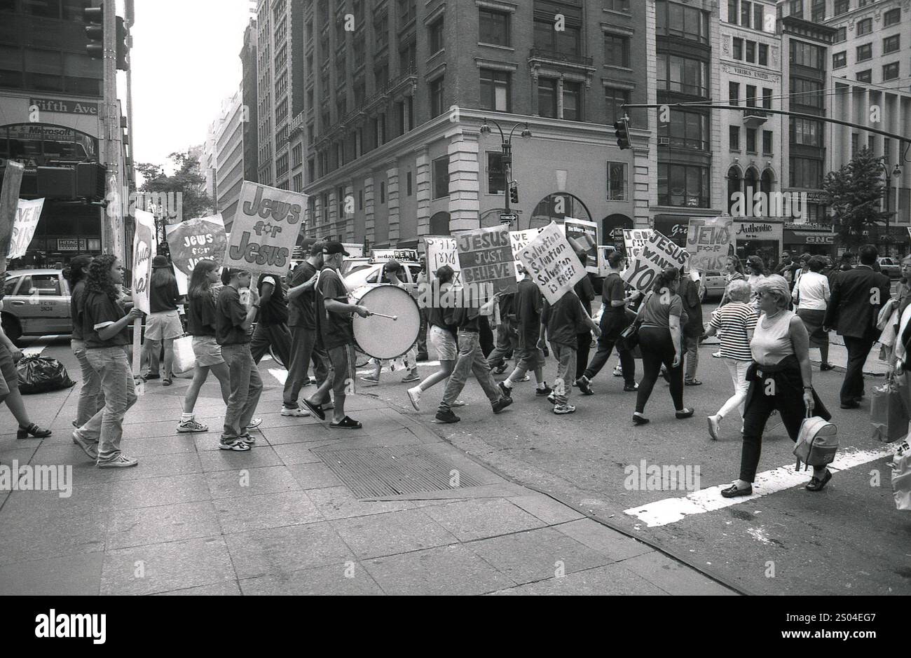 1998,side view of a Jewish religious march, Jesus banners, Fifth Avenue ...