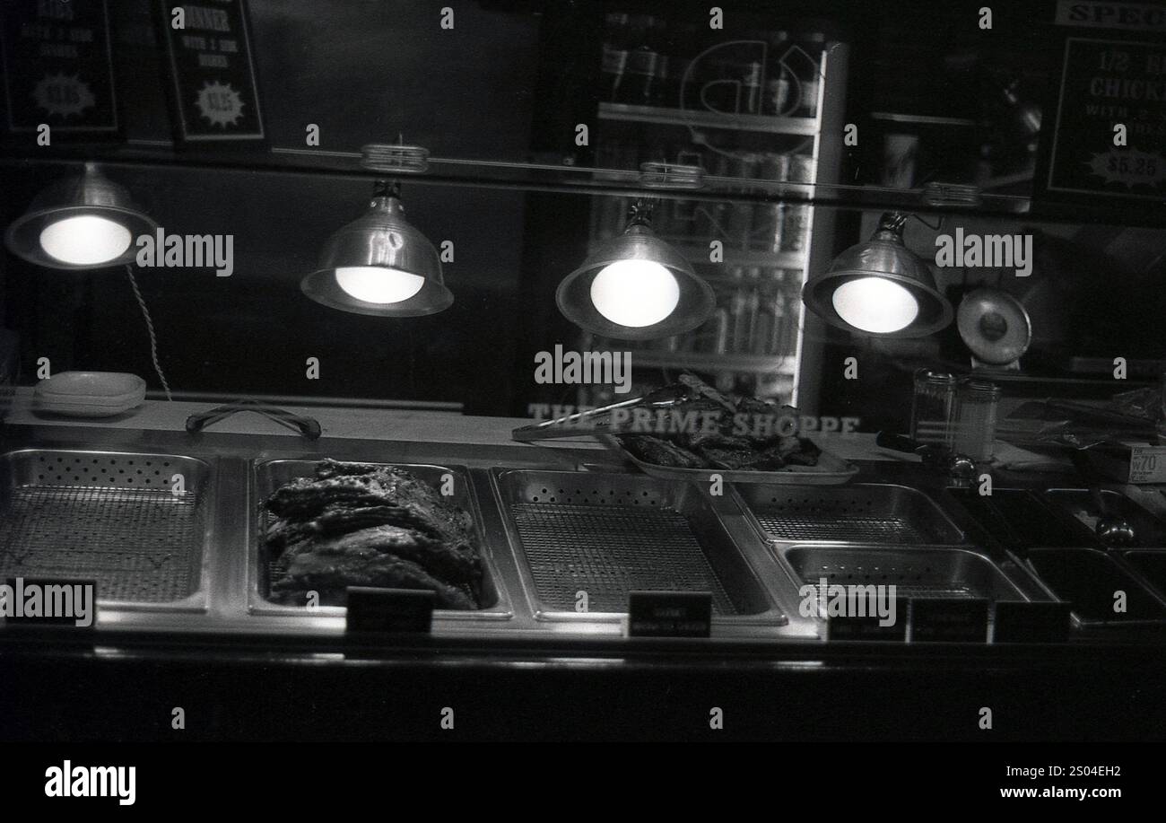 1990s, interior of a fast food restaurant, showing counter display ...