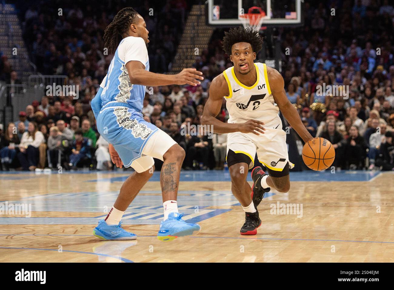 Cleveland Cavaliers' Darius Garland, left, defends as Utah Jazz's ...