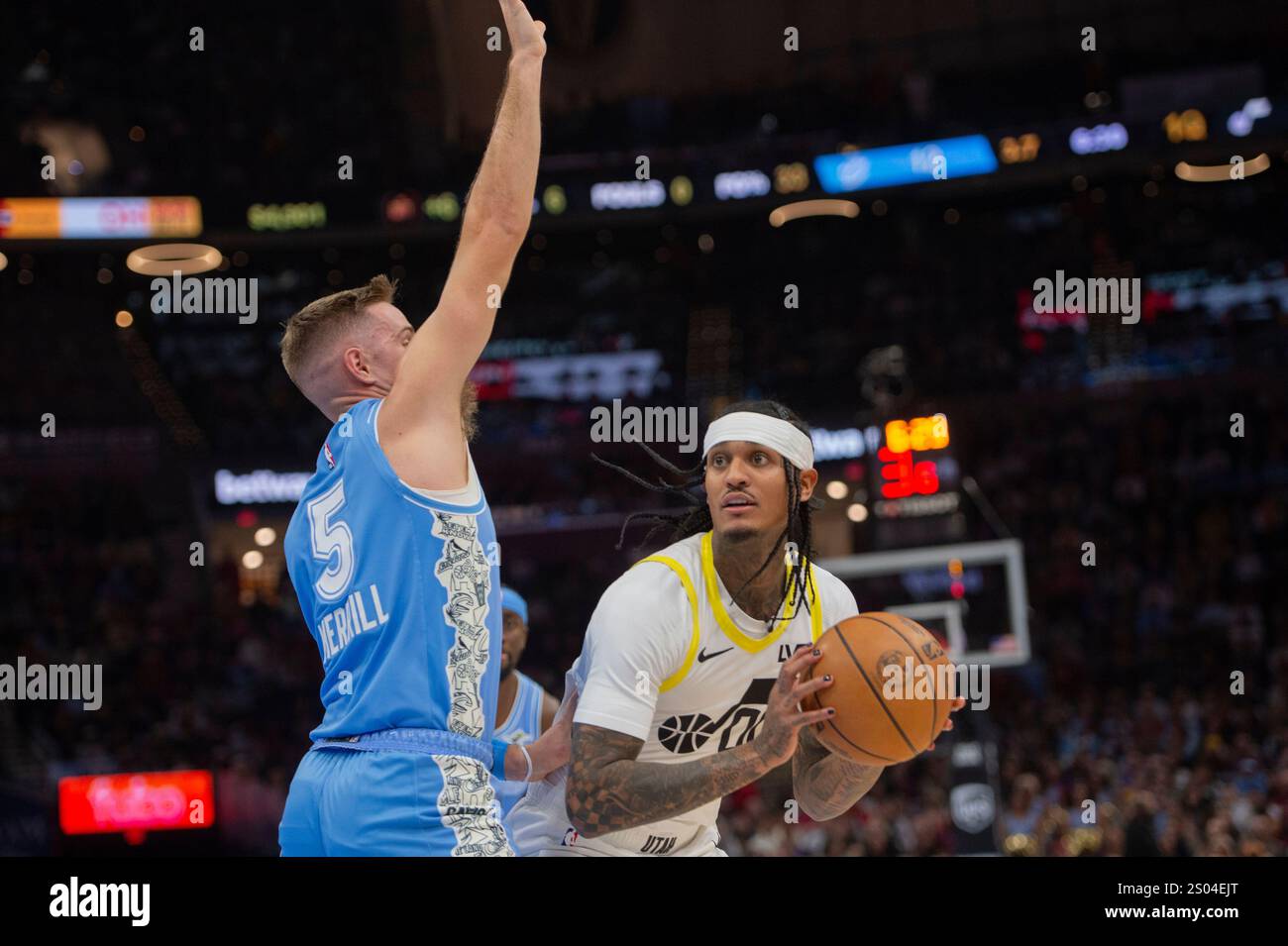 Cleveland Cavaliers' Sam Merrill (5) defends as Utah Jazz's Jordan ...