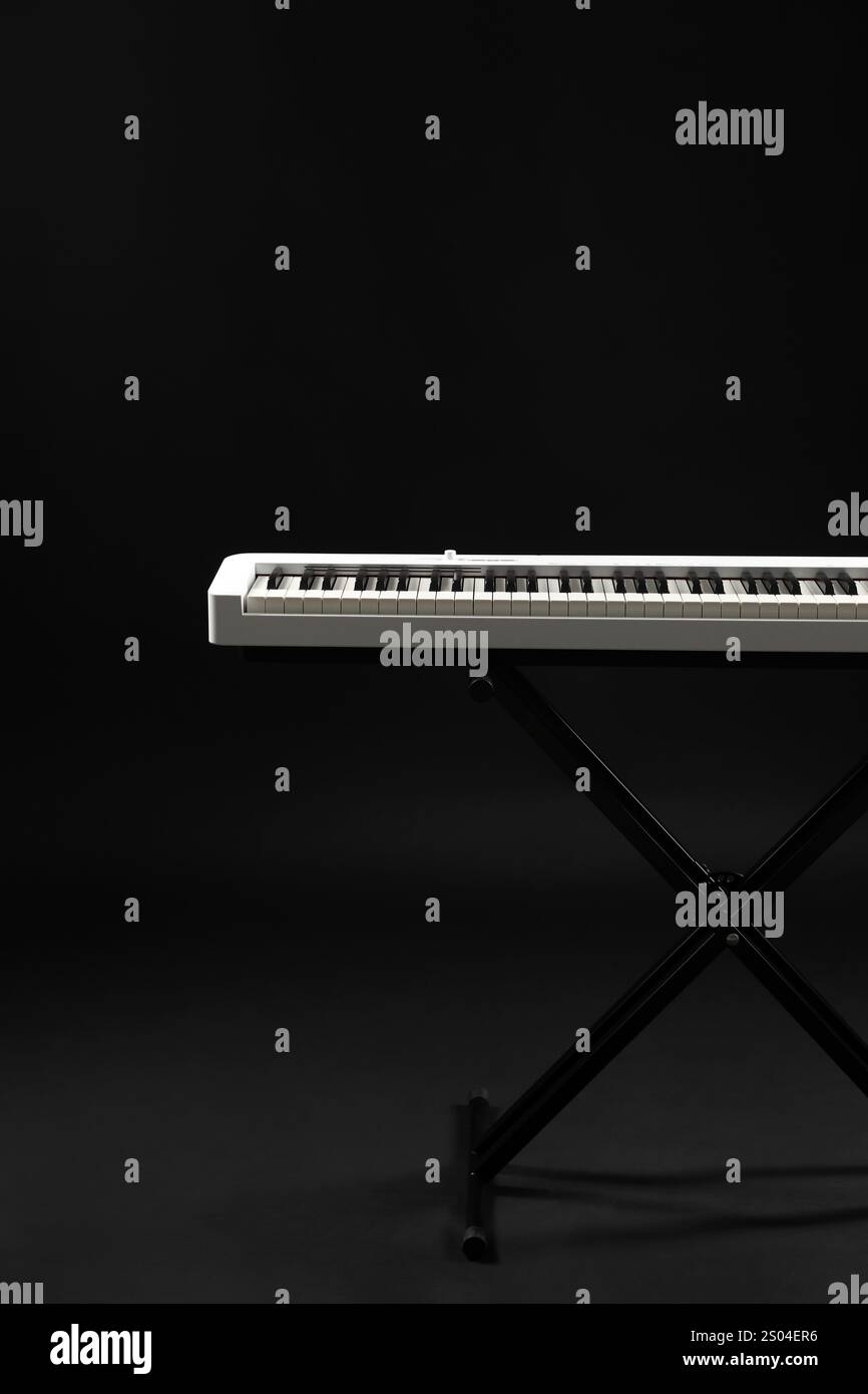 Synthesizer on black background. Electronic musical instrument Stock ...