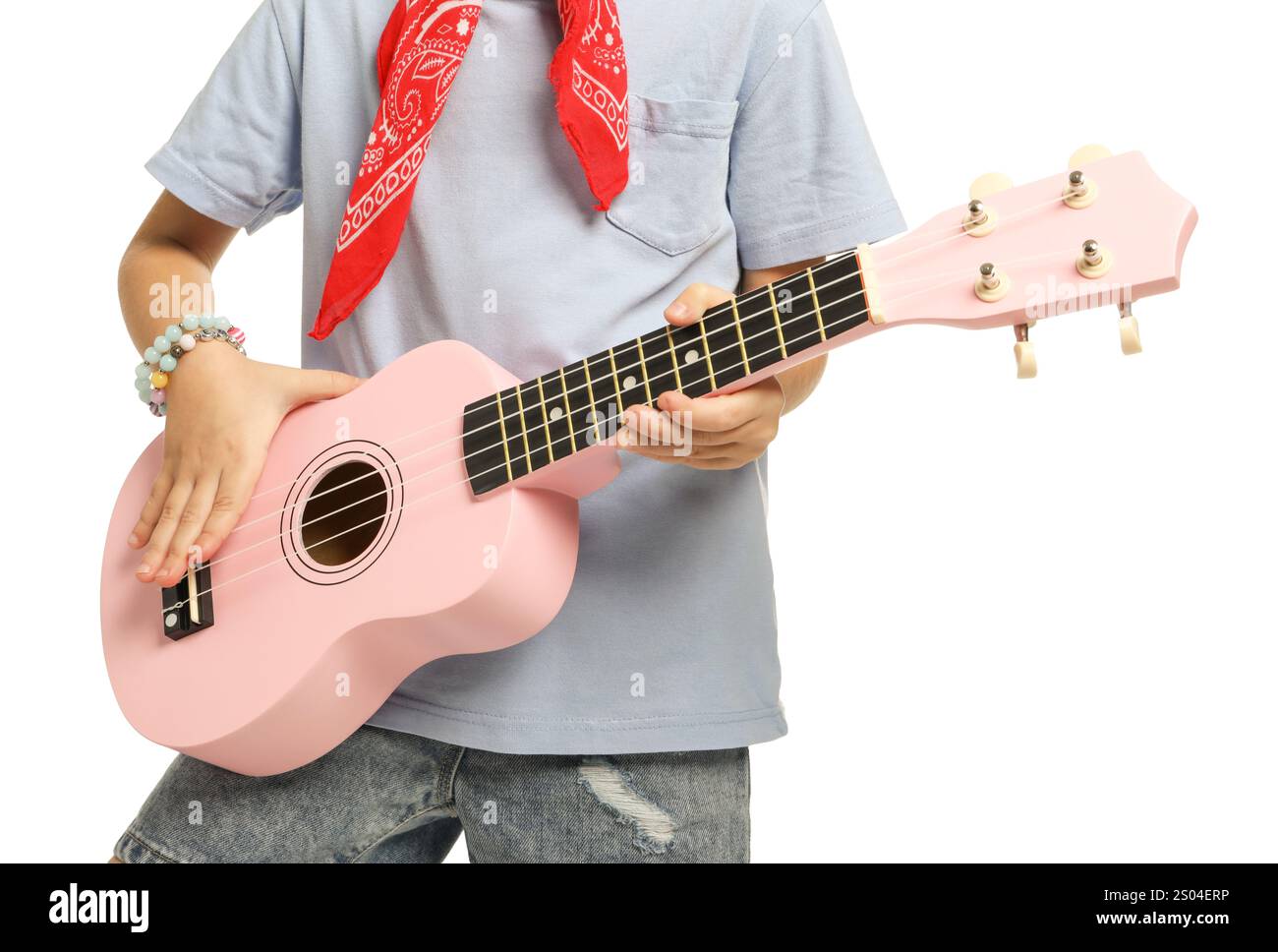 Little girl playing ukulele on white background, closeup Stock Photo ...