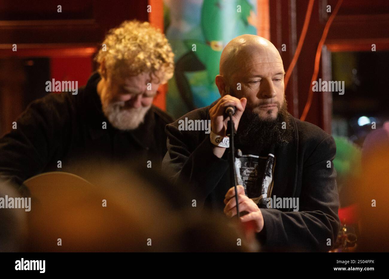 A performer takes part in the annual Christmas Eve busk outside the ...