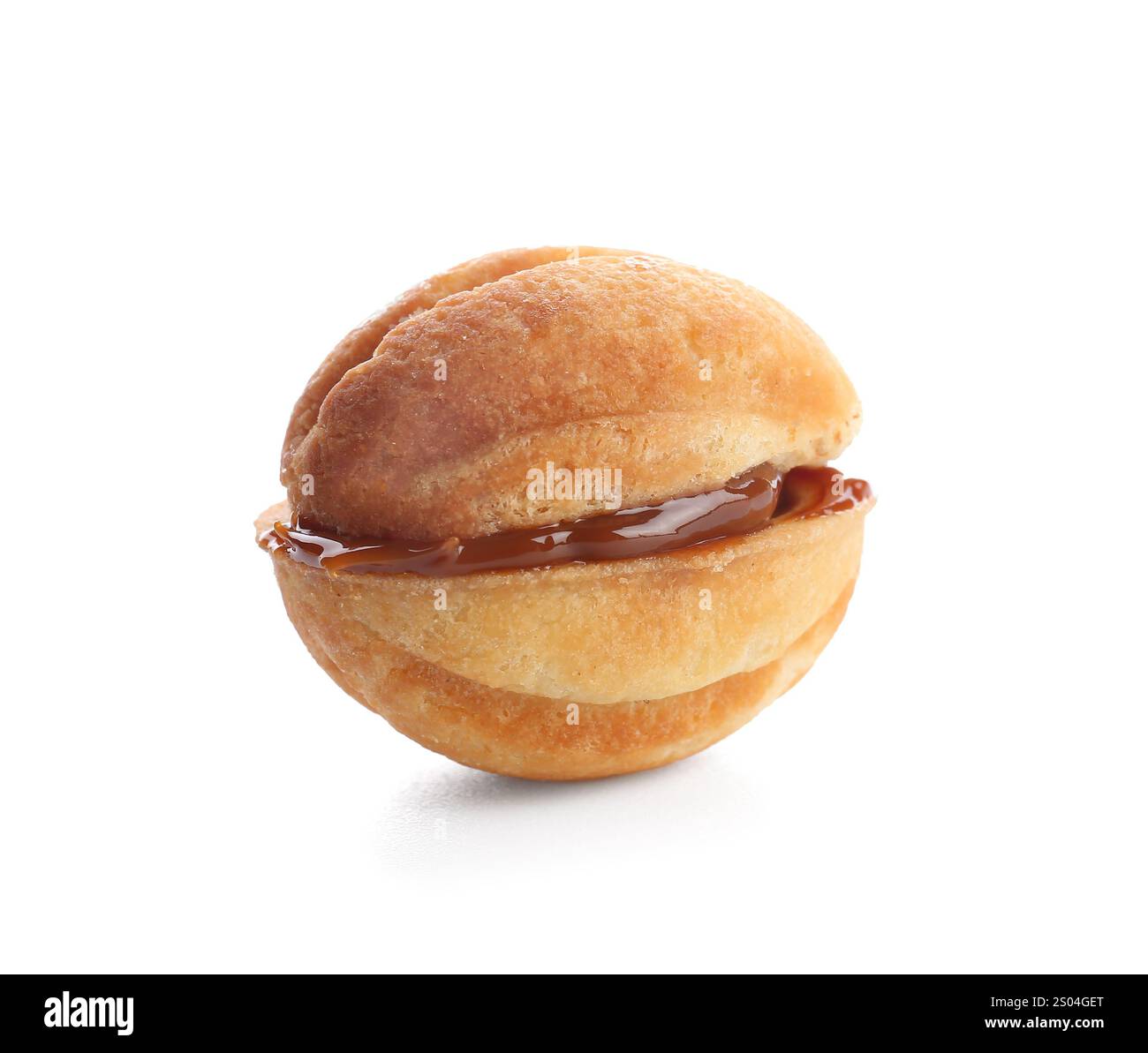 Sweet walnut shaped cookie with boiled condensed milk on white ...