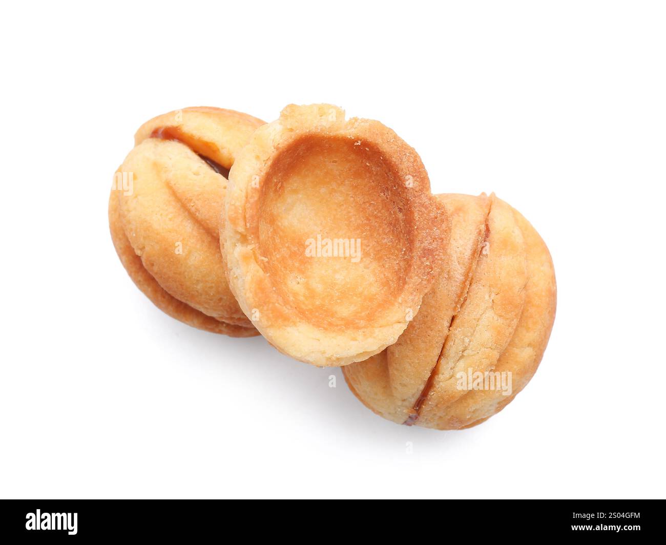 Sweet walnut shaped cookies with boiled condensed milk on white ...
