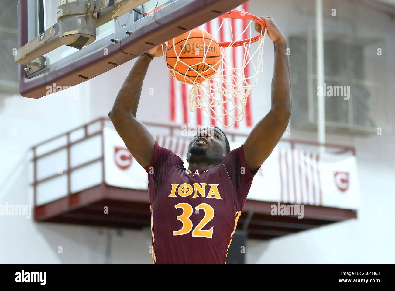 December 22, 2024: Iona Gaels forward Yaphet Moundi (32) dunks against ...