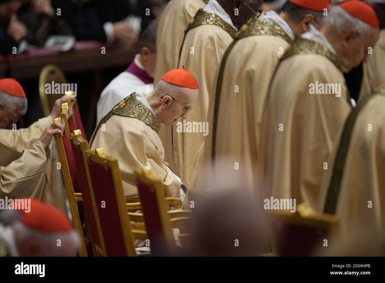 Cardinal Tarcisio Bertone follows Pope Francis presiding over the ...