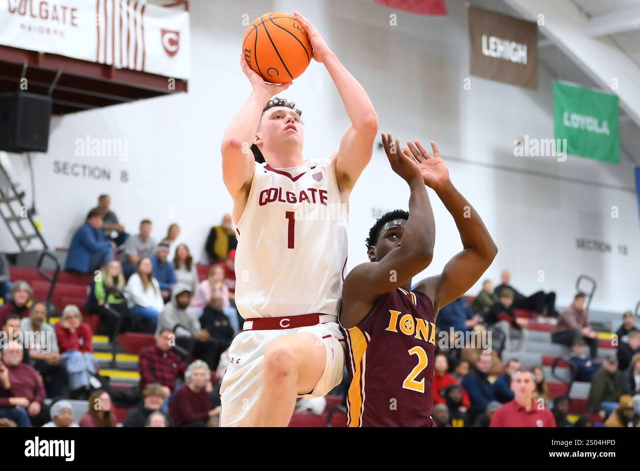 December 22, 2024: Colgate Raiders guard Brady Cummins (1) shoots the ...