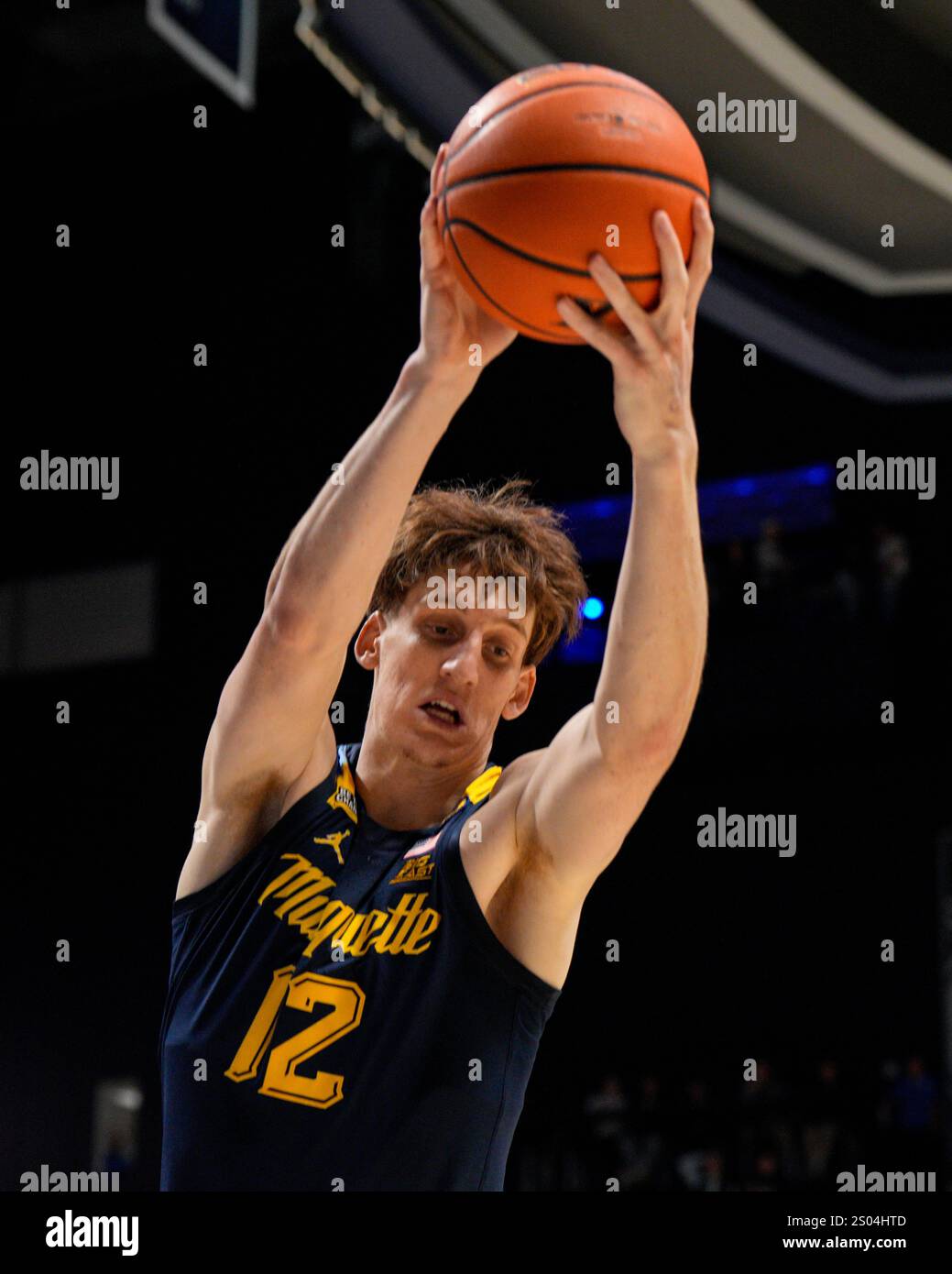 Marquette forward Ben Gold (12) rebounds during an NCAA college ...
