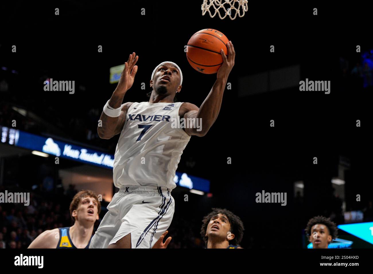 Xavier guard Ryan Conwell (7) shoots during an NCAA college basketball ...