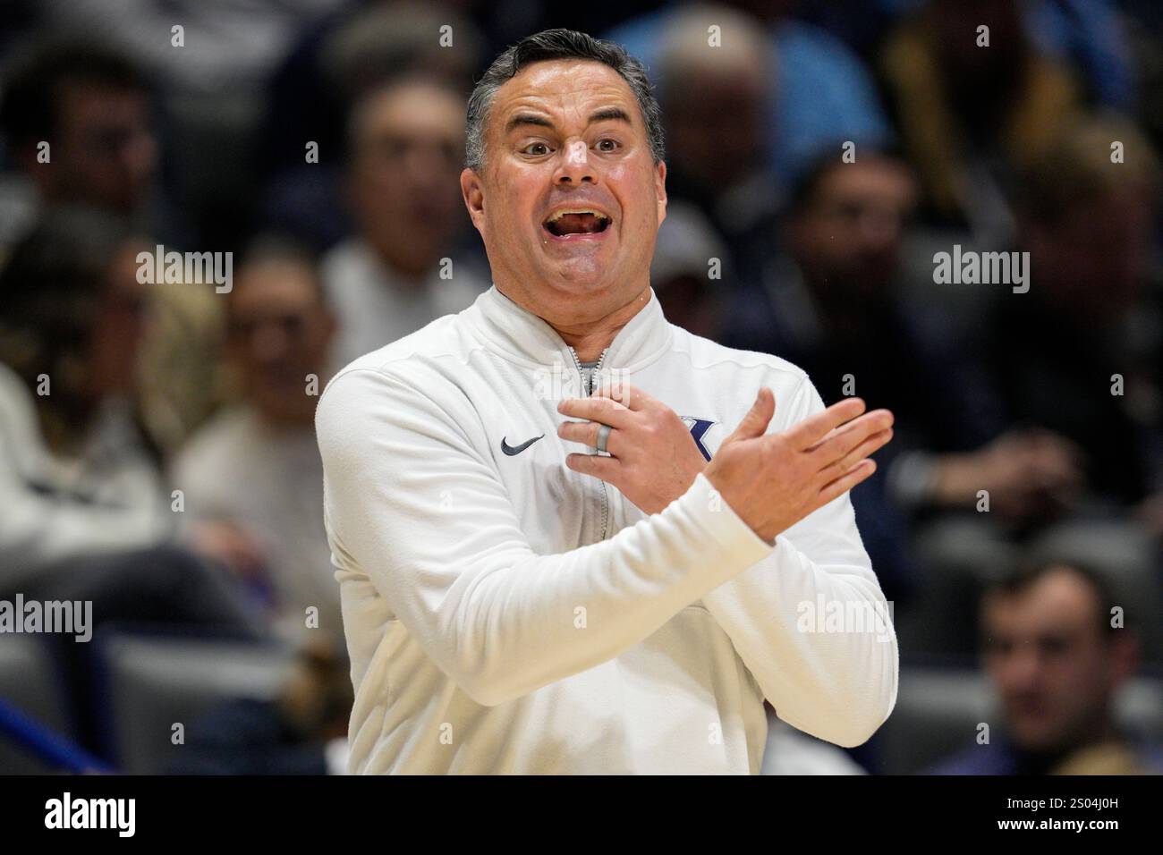 Xavier head coach Sean Miller gestures during the first half of an NCAA ...