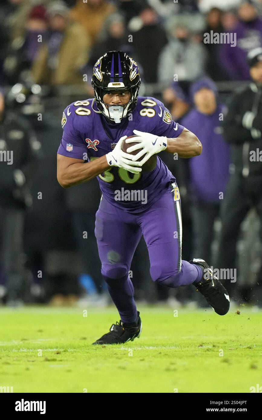 Baltimore Ravens tight end Isaiah Likely (80) wins after a catch during ...