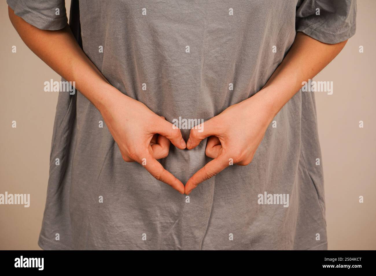 Two hands interlocked in the shape of a heart deliver a clear message ...