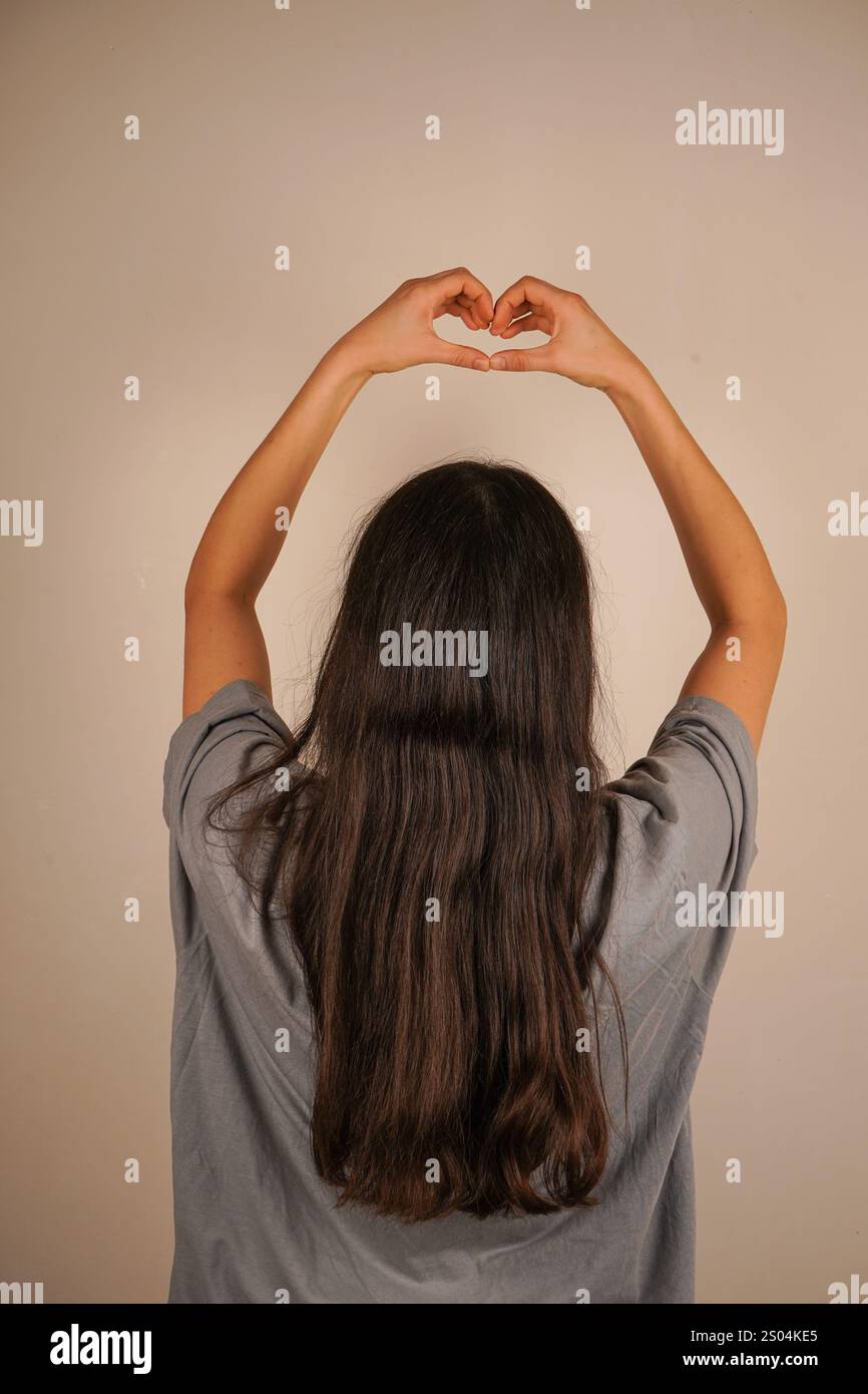 Two hands interlocked in the shape of a heart deliver a clear message ...