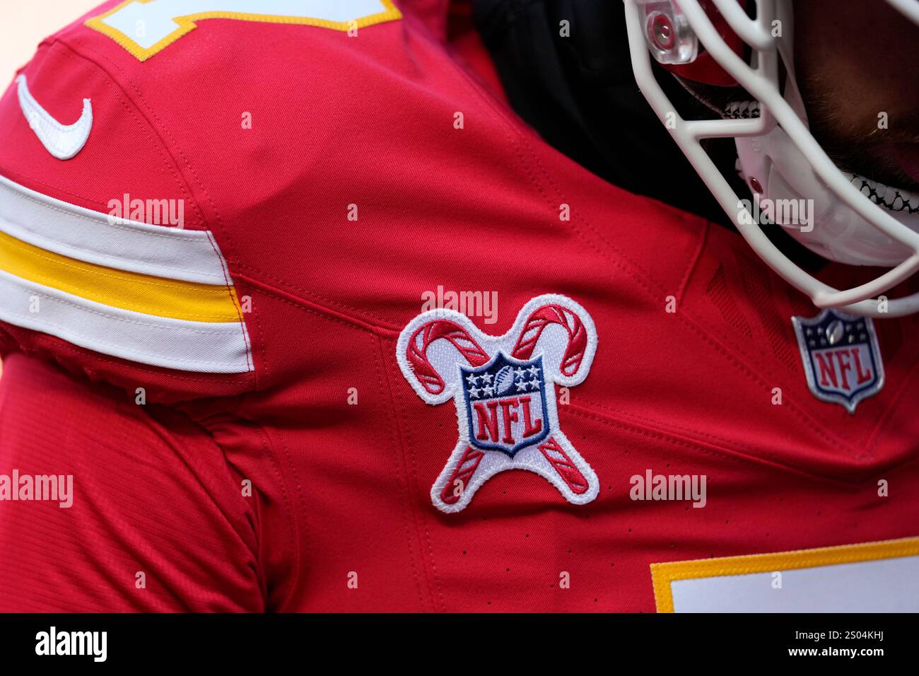 An NFL logo with candy canes is seen on the jersey of Kansas City ...