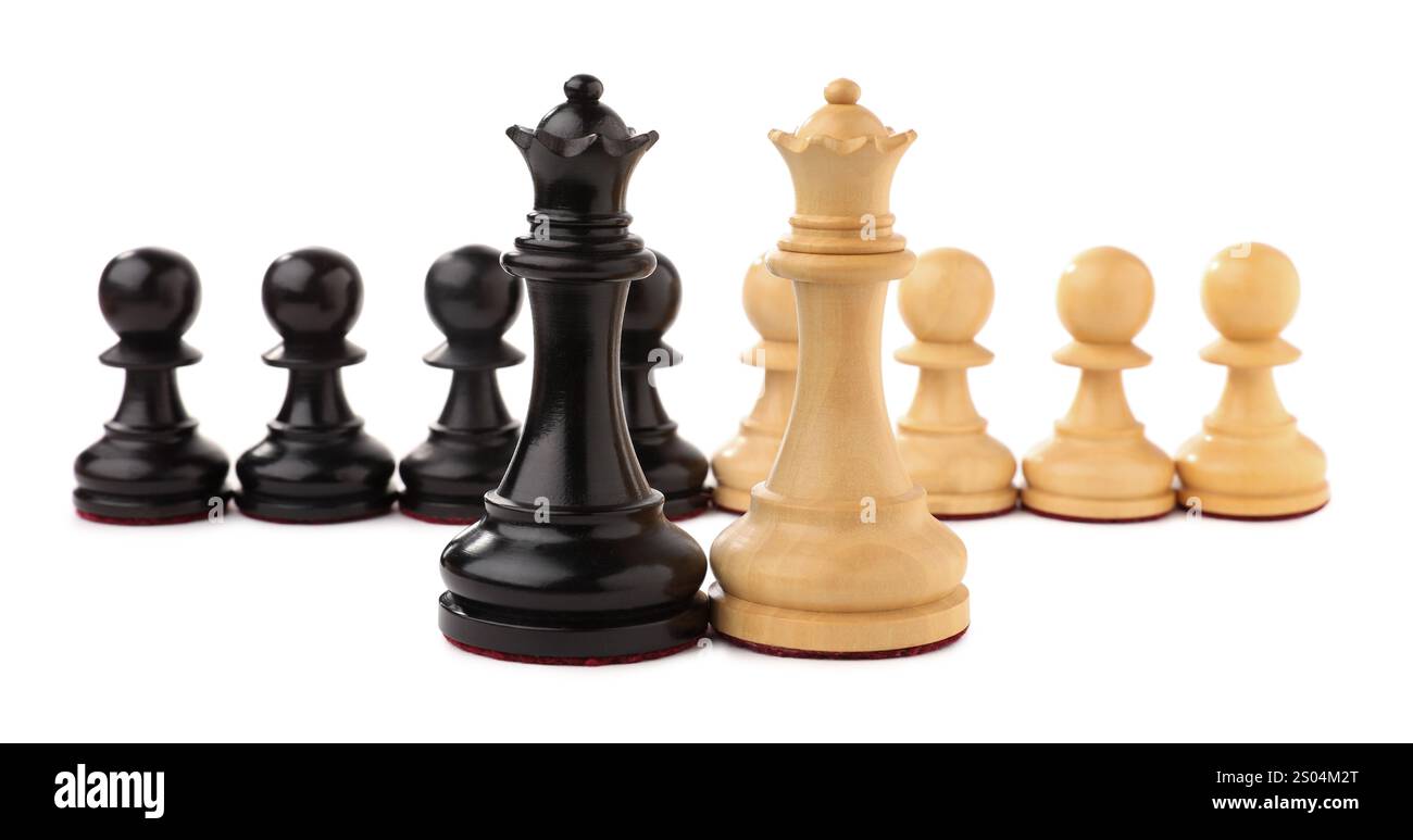 Black and white chess queens in front of pawns on white background ...