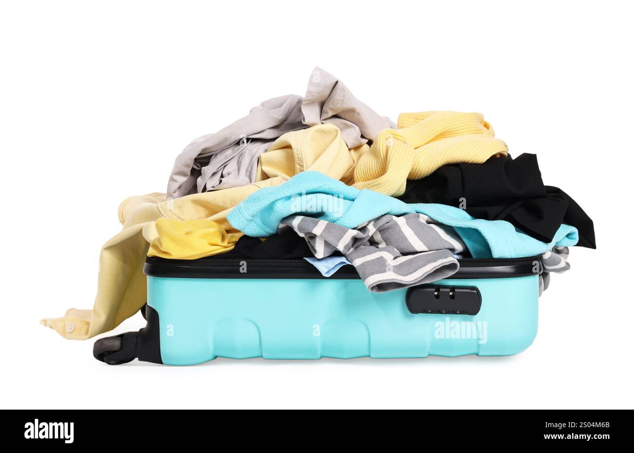 Open suitcase full of different messy clothes isolated on white Stock ...