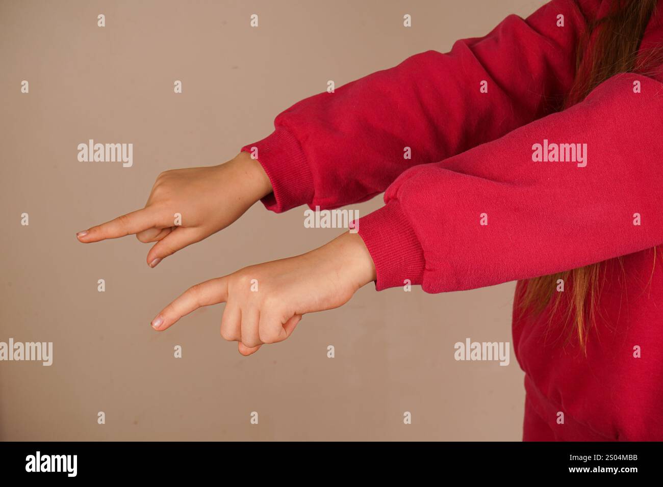 A pair of hands with extended index fingers pointing in different ...