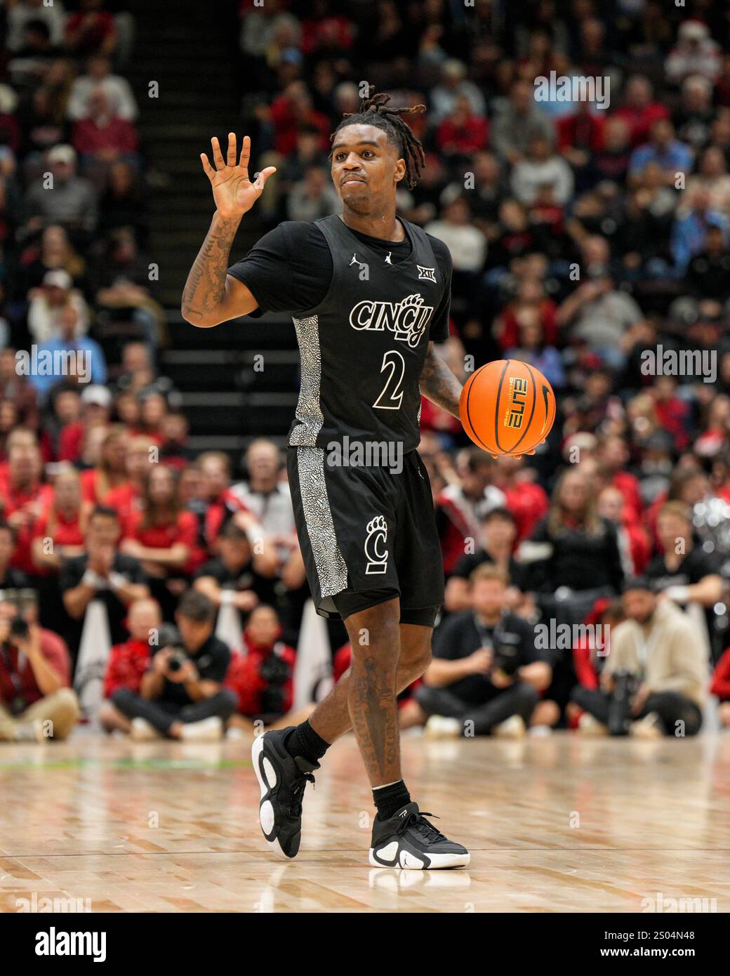 Cincinnati guard Jizzle James (2) gestures during an NCAA college ...