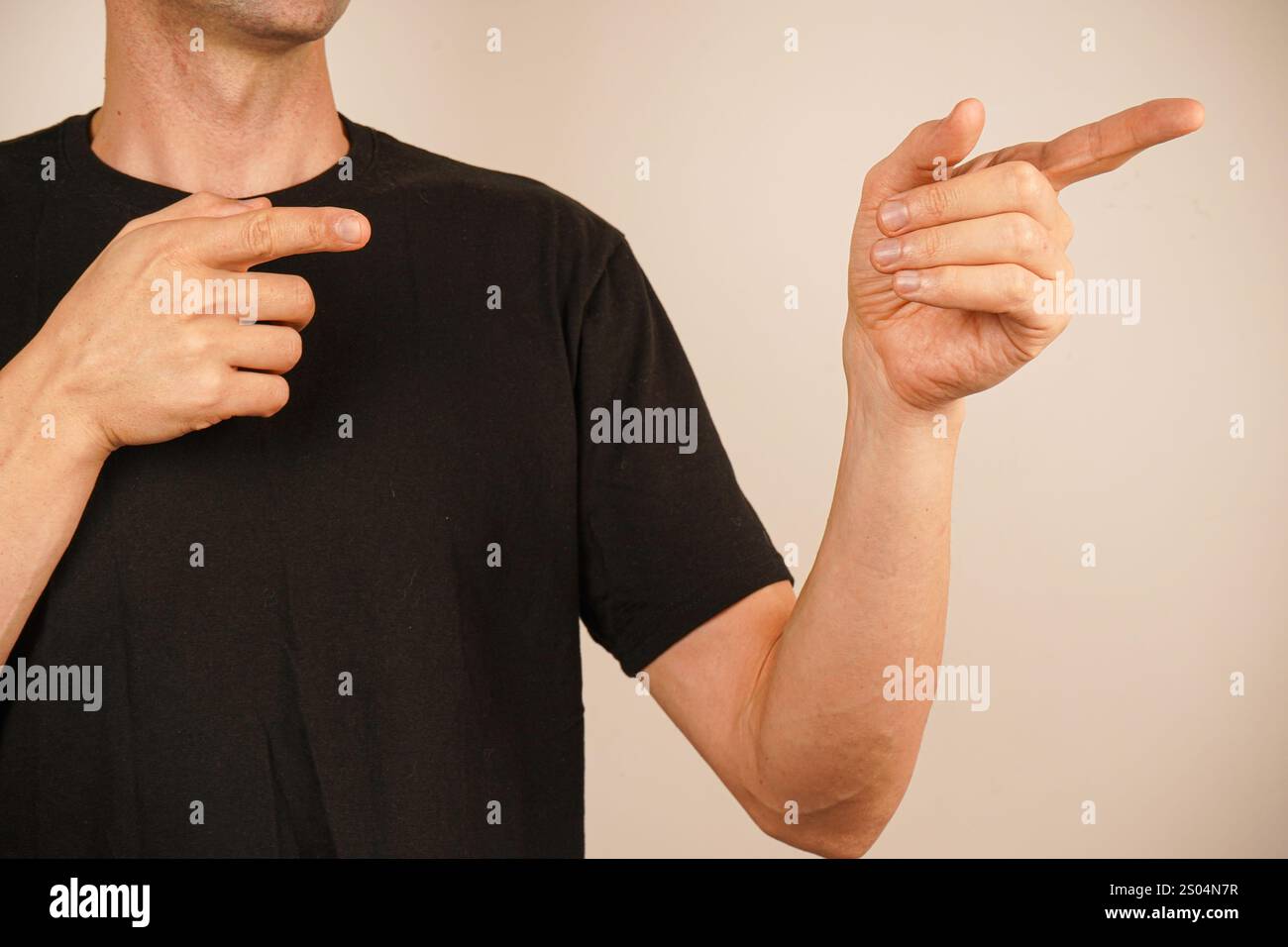 Gestures with opposite hands, index fingers. The texture of the black t ...