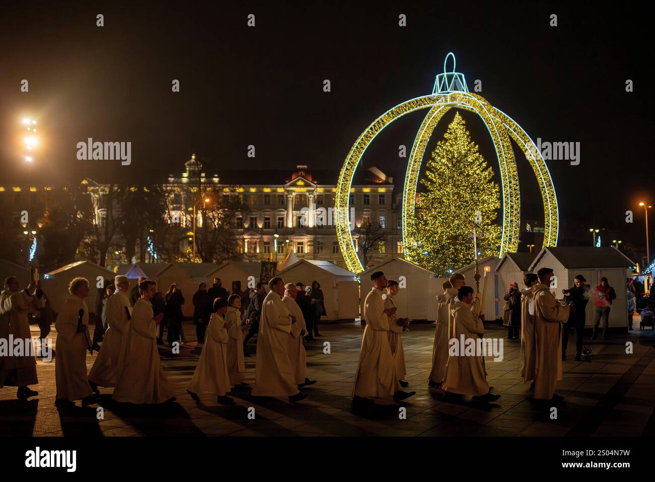 Priests and clergy walk in a procession to attend the Christmas ...