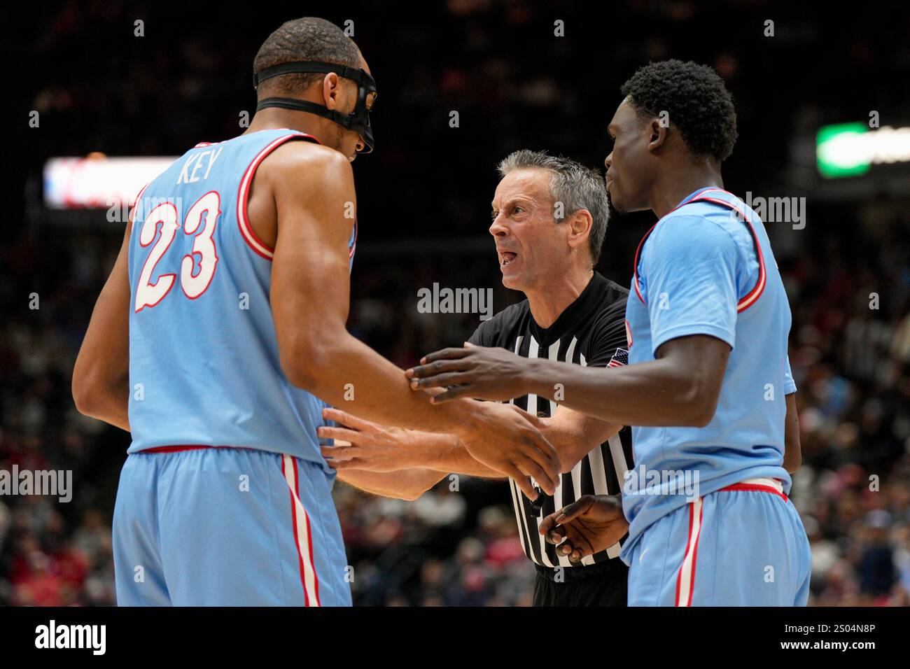 Dayton forward Zed Key (23) speaks with an official during the first ...