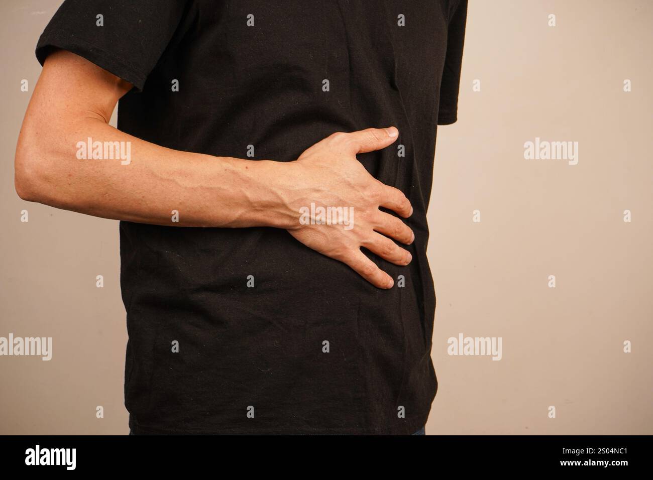 A hand clutches the stomach, expressing discomfort. The neutral ...